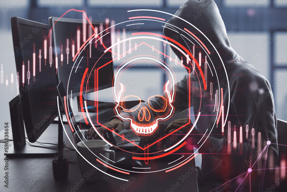 Side view of hacker using laptop with abstract glowing skull hologram on blurry office interior ...