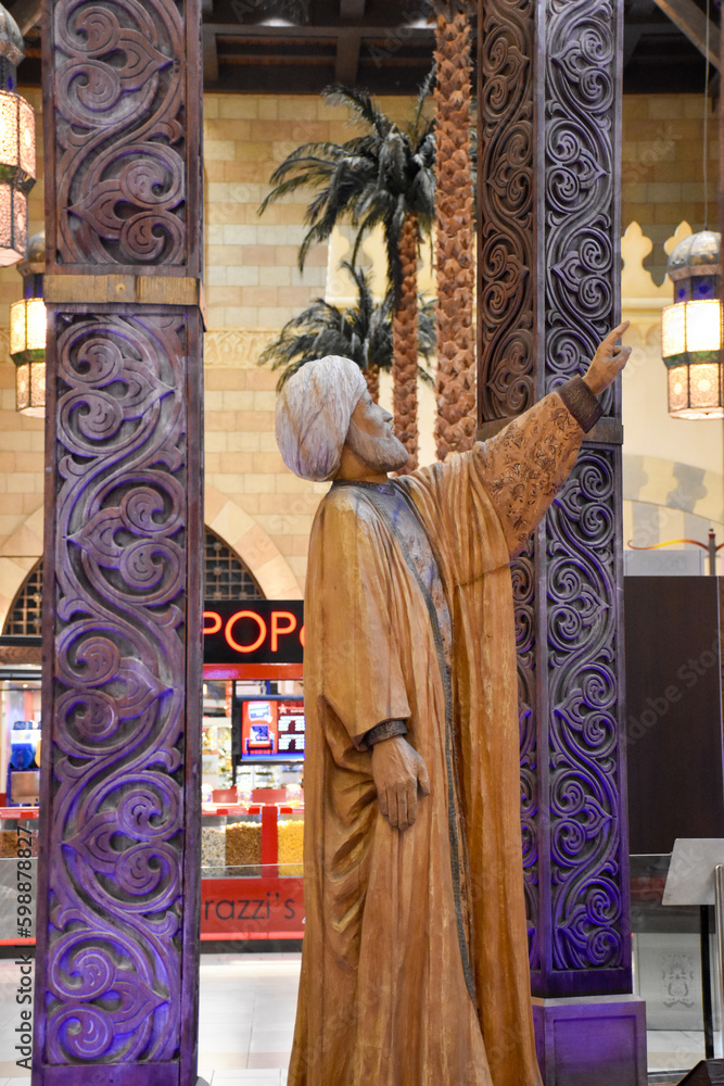 A close-up of a statue of an Arab inventor inside Ibn Battuta Mall in ...