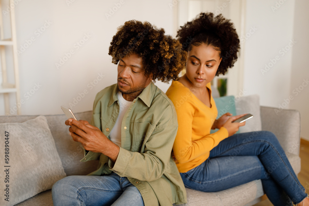 Black Wife Spying Reading Husband's Messages Peeking At Phone Indoors ...
