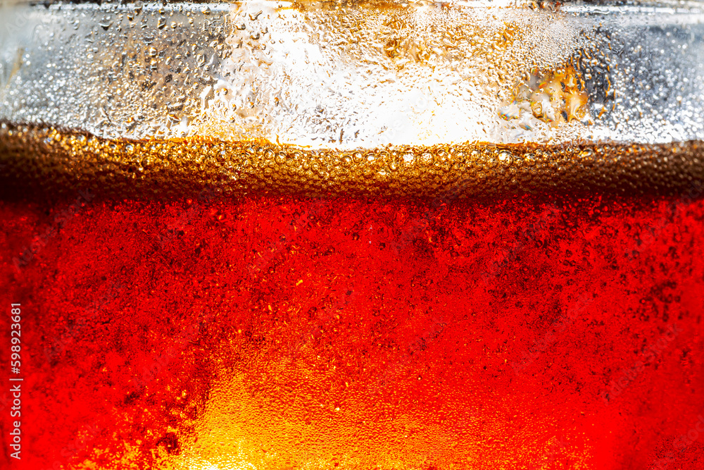 macro cola background,Background of cola with ice and bubbles. Side ...