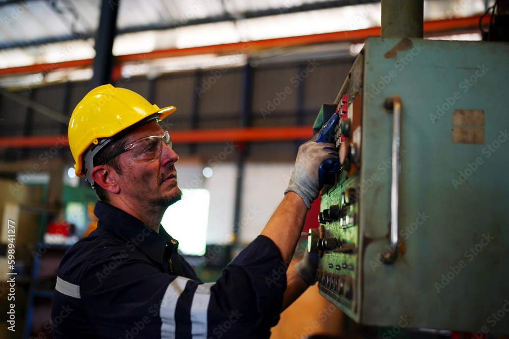Lathe Operators Concentrated on Work. Worker in uniform and helmet ...