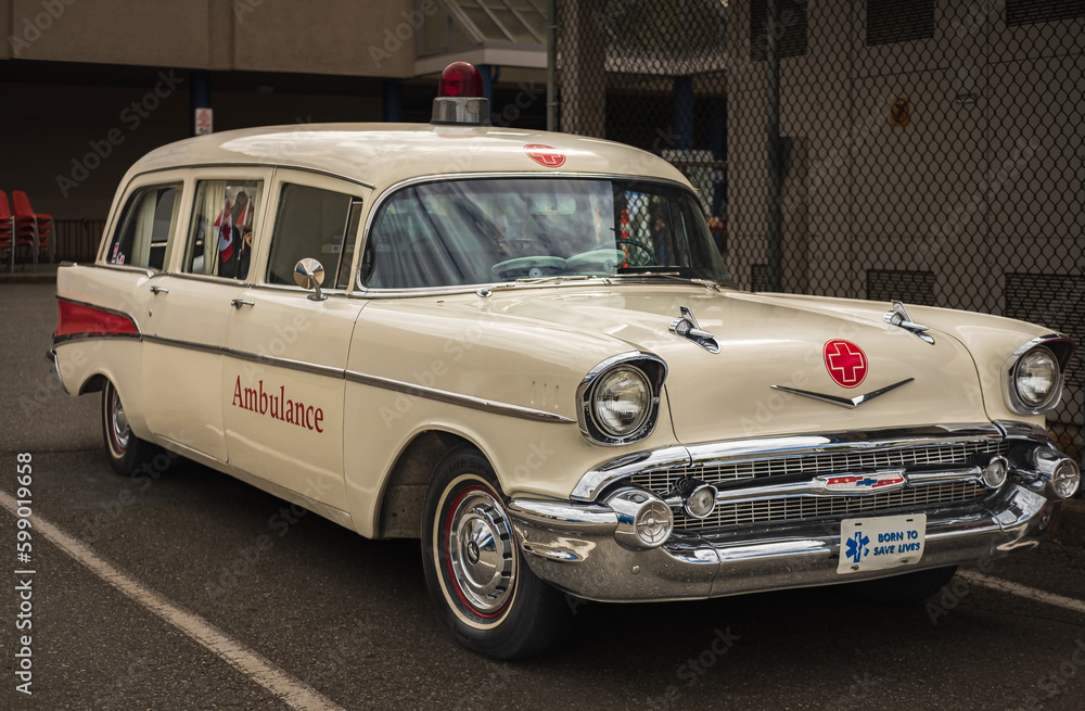 Vintage Classic car 1957 Chevy Ambulance Station wagon, Ambulance Service parked on a street ...