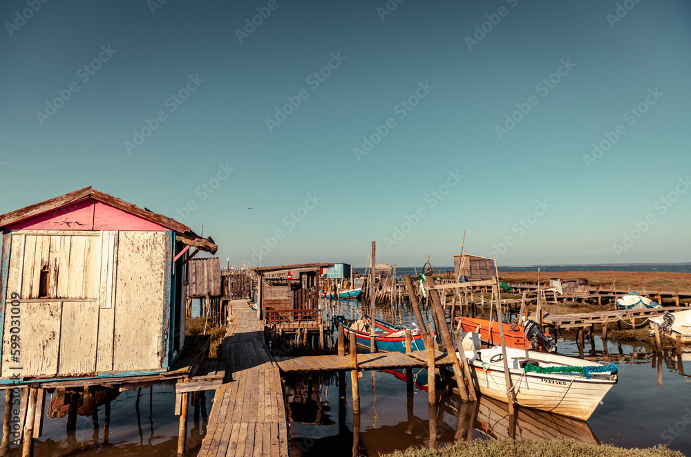 Wooden walkways and huts of the Cais de Palafitas da Carrasqueira.,Palafitico da Carrasqueira ...
