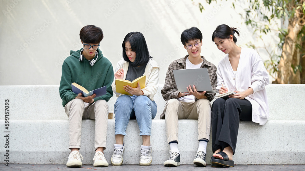 College Students Sitting On Bench