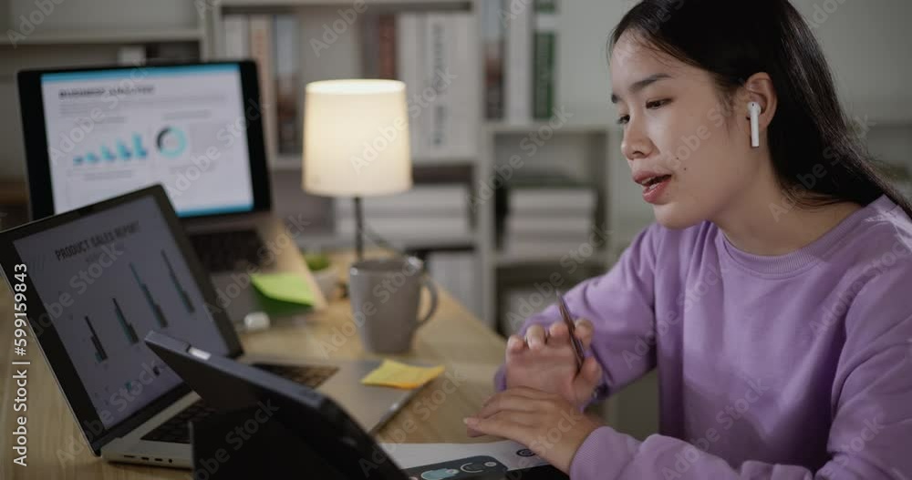 Video Stock Footage of young Asian woman using an app on pc for ...