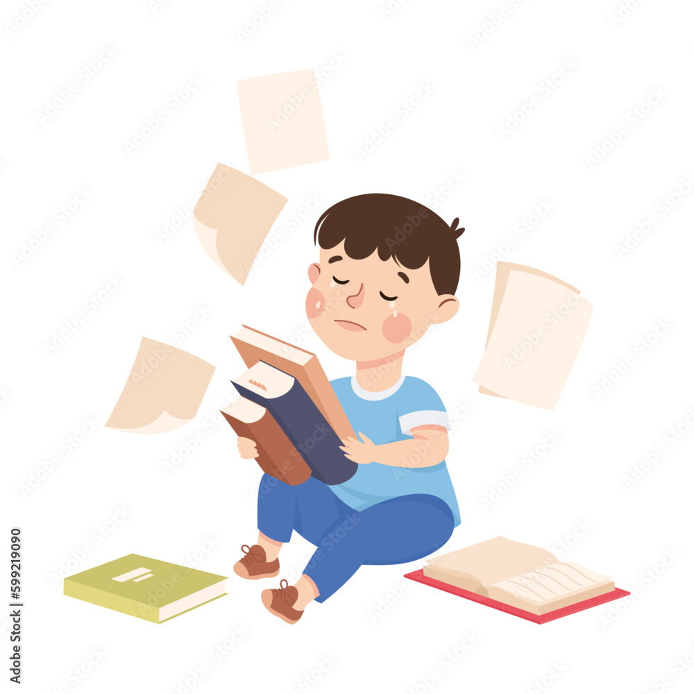 Crying boy sitting on floor with books scattered around him. Stressed ...