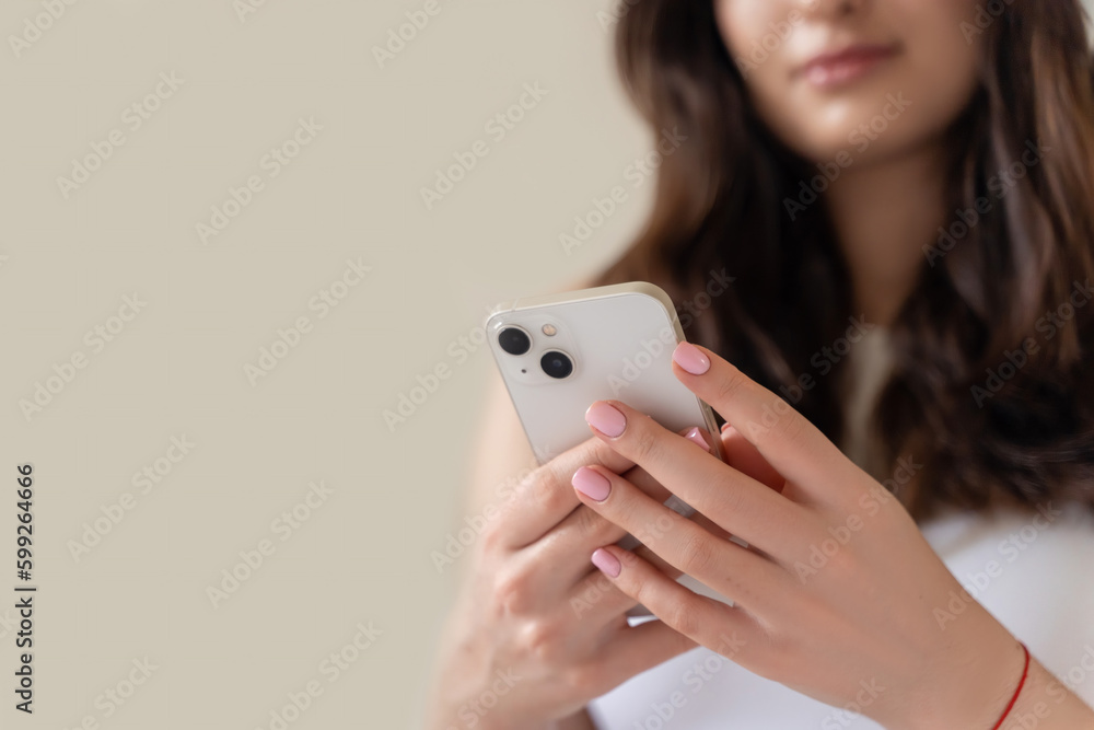Young woman hands using smartphone close up. Teenage girl scrolling ...