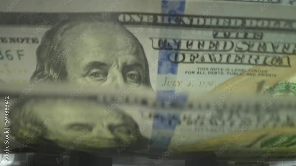 Finance and cash dollars concept. Counting dollars with electronic ...