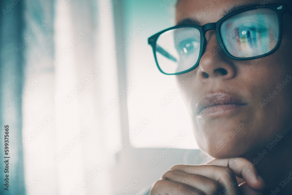 Portrait of thoughtful woman closeup touching her chin and wearing ...