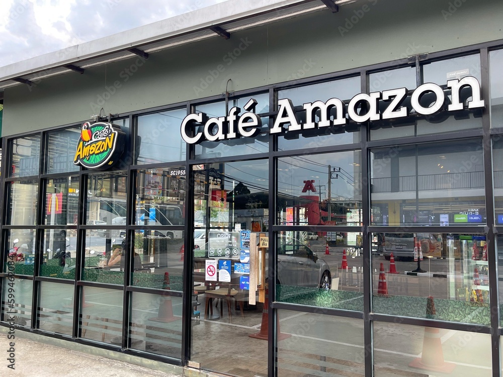 One-story stand-alone amazon cafe building on a sky background ...