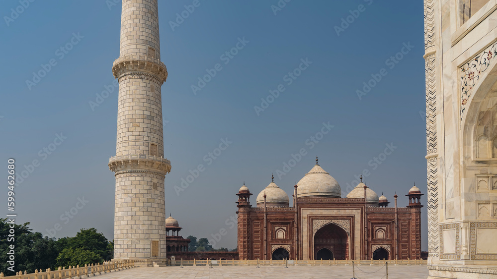 Details of the architecture of the Taj Mahal. A high white marble ...