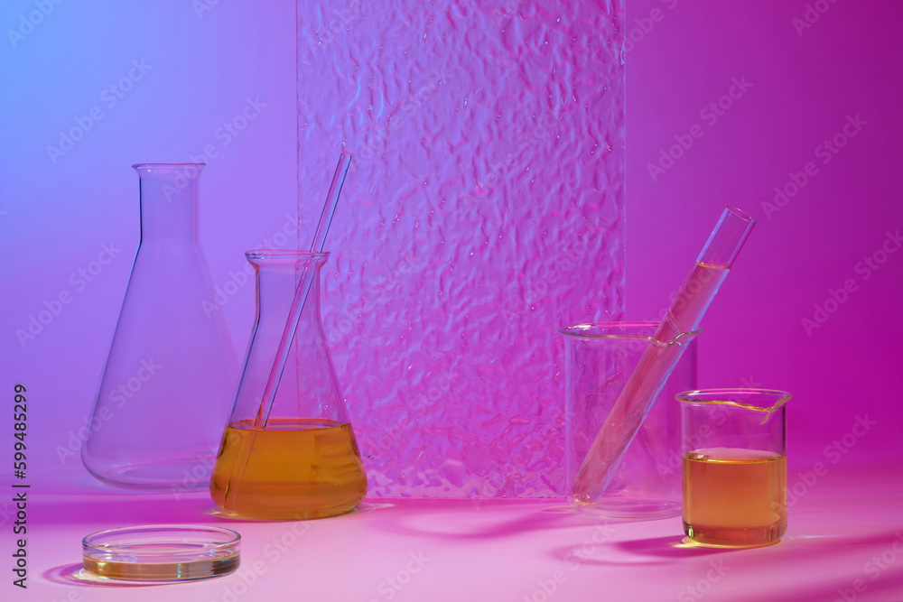 Transparent acrylic sheet decorated with conical flasks, test tubes ...