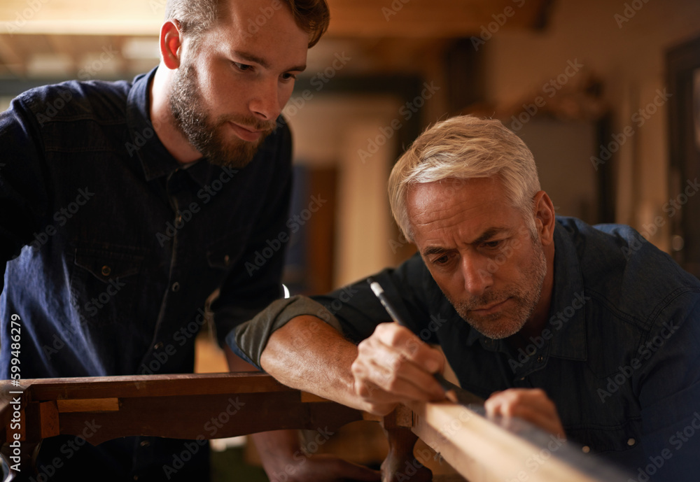 Teaching, learning and carpentry apprentice and help with pencil in ...