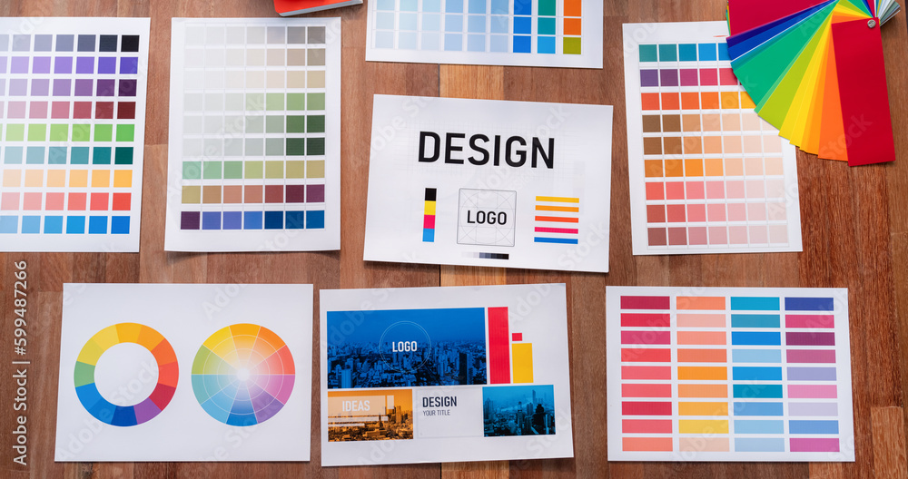 Panorama shot of various color palette idea papers arranged neatly on ...