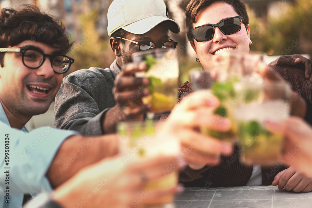 Non-Binary Person and Friends at Outdoor Bar - A non-binary individual ...