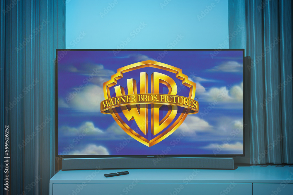 Warner Bros. intro logo on TV screen. Warner Bros pictures is an U.S ...