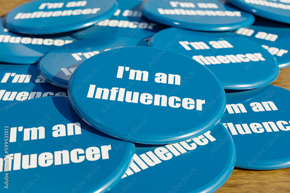I'm an influencer. Blue badges laying on the table with the message "I ...