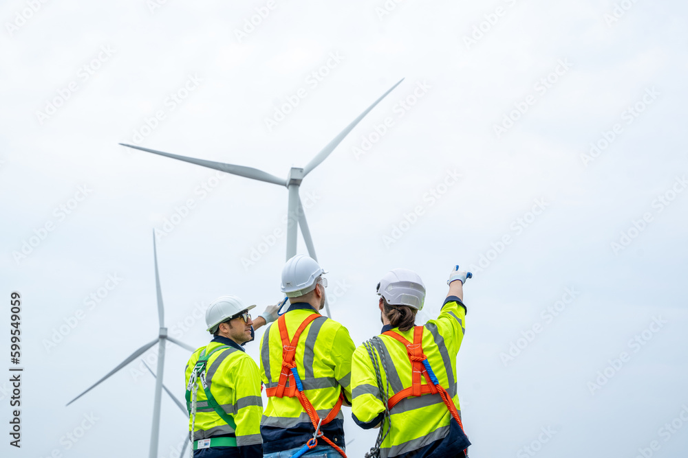 Technician engineers inspection work in wind turbine power generator ...