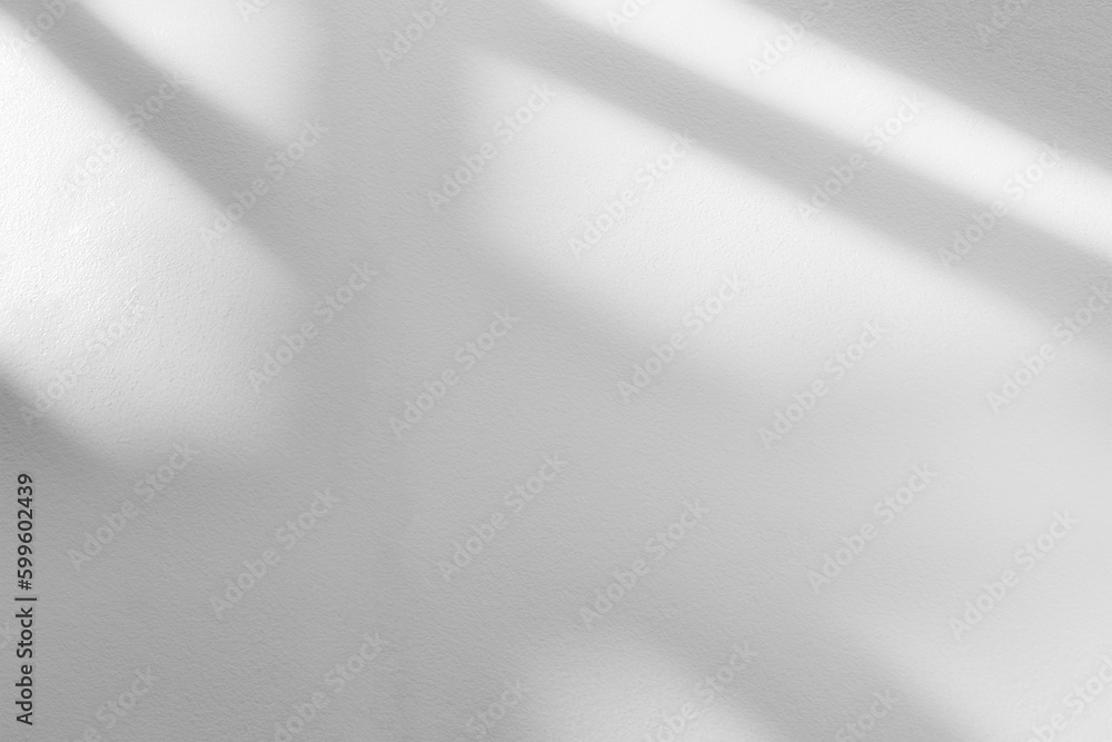 Abstract light reflection and grey shadow from window on white wall ...