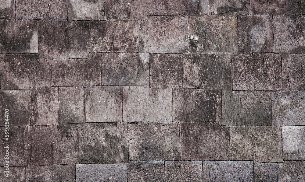Ancient stone wall background and texture. These stone blocks were used ...