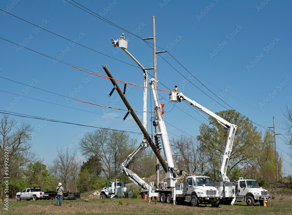 New Utility Pole Being Lifted in Place Stock Photo | Adobe Stock