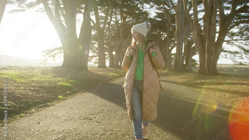 Nice female on hiking adventure 4K. Smiley pretty woman with tourist ...