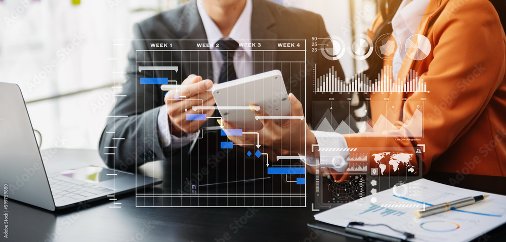 Businessman hand Project manager working and update tasks and Gantt ...