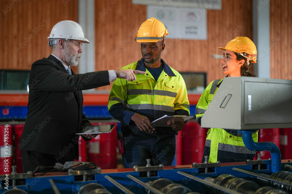 Senior boss manager talking staff engineer assistant woman and African ...