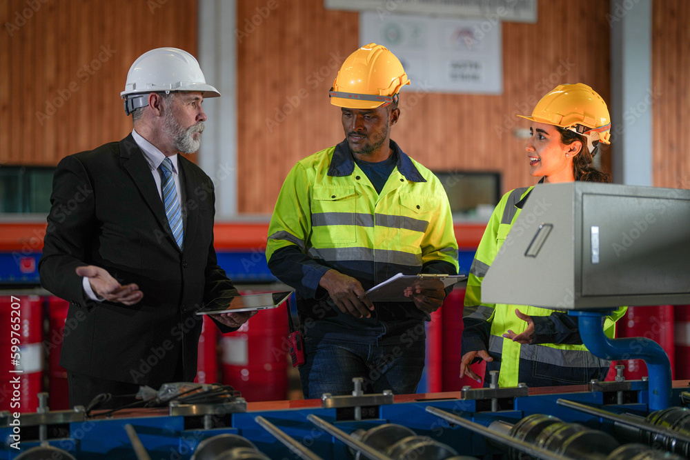 Senior boss manager talking staff engineer assistant woman and African ...