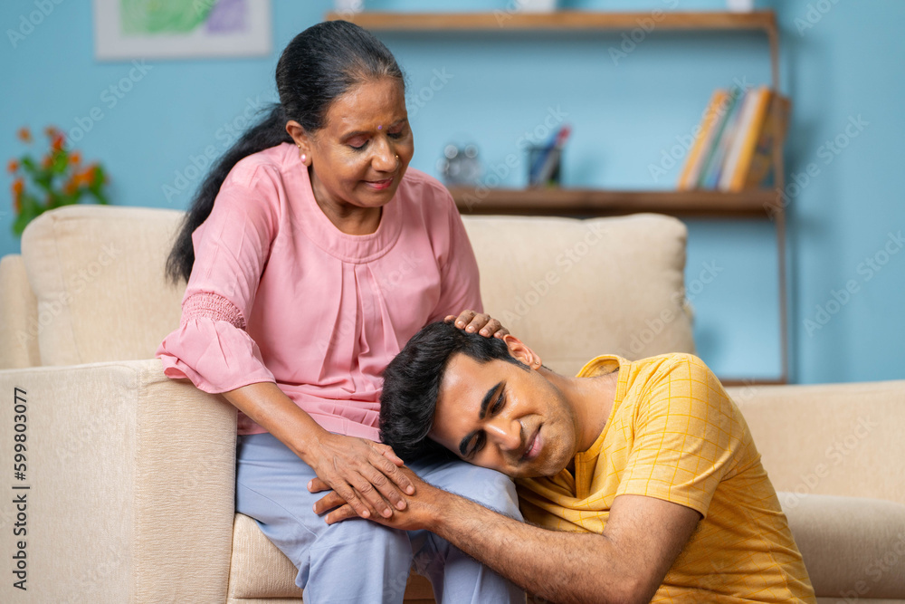 Indian Senior Mothers Talking To Adult Son By Consoling While Son