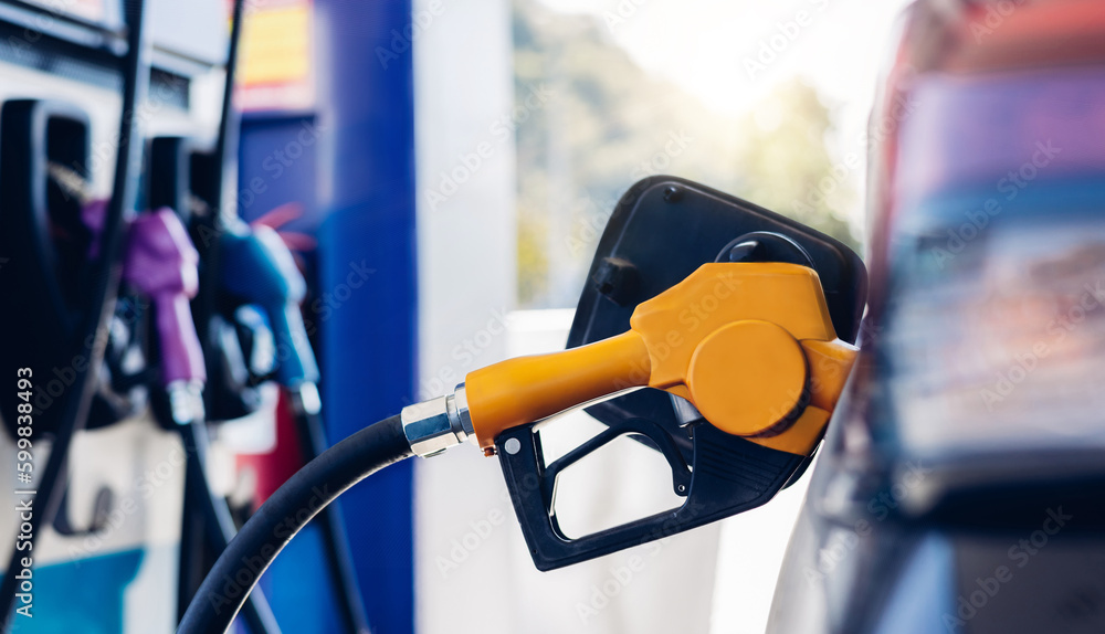 Refill and filling Oil Gas Fuel at station. Gas station - refueling. To ...