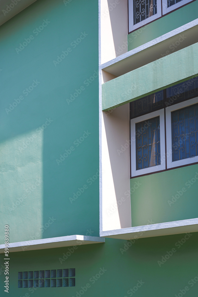 Sunlight and shadow on surface of Shading Fin concrete with glass ...