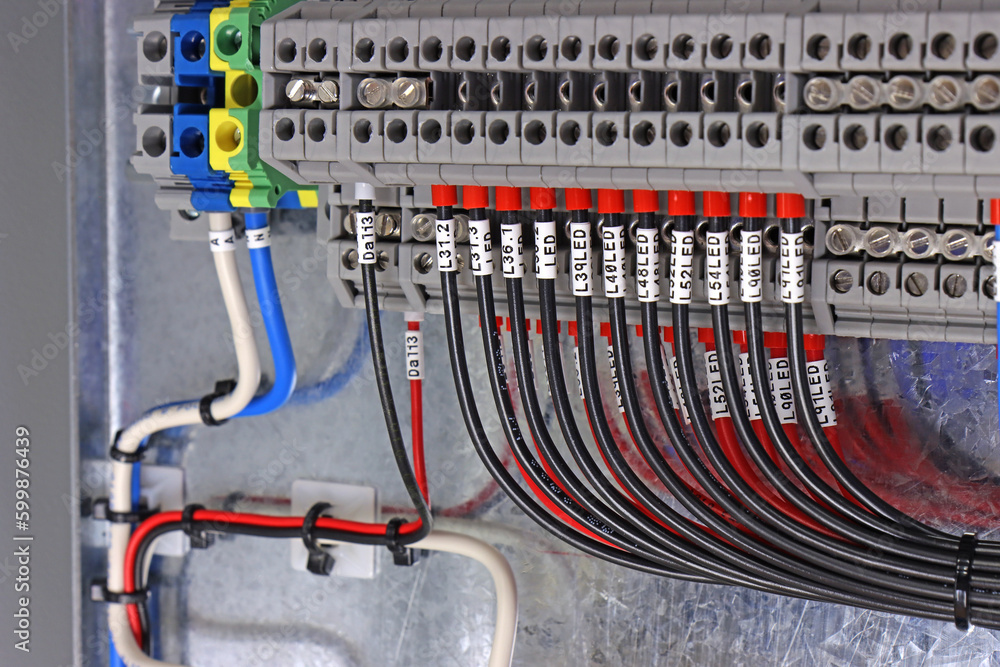 Electrical terminals with connected mounting wires marked. Located on a ...