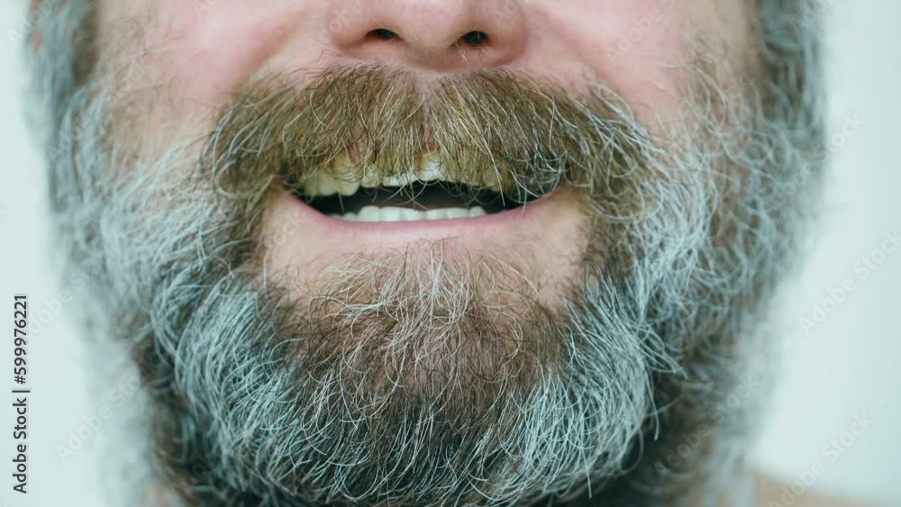 Emotional laughter of a man. Slow motion. A man with a lush, unkempt ...