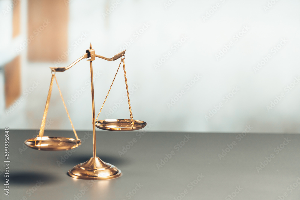 Shiny golden balanced scale in court library background as concept ...