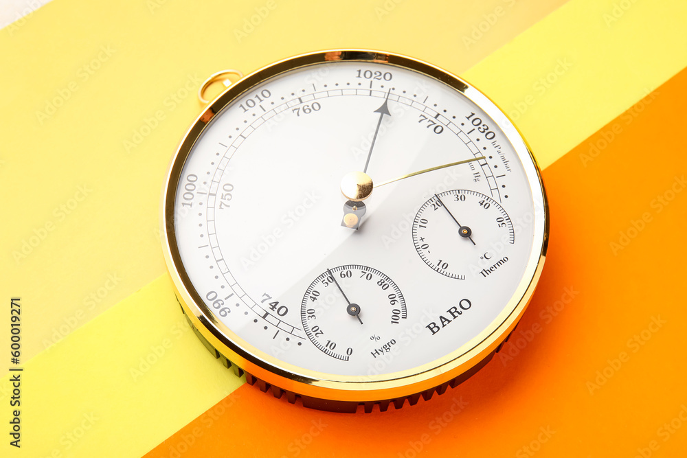 Aneroid barometer on colorful background Stock Photo | Adobe Stock
