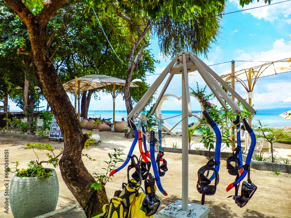 Foto de GILI AIR, BALI – MARCH 2023 – Streets and colorful shops and ...