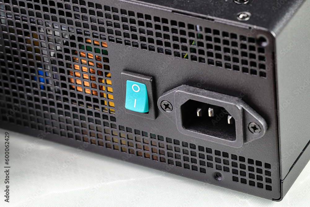 Rear view of Modern power supply unit, On Off switch and power cord ...