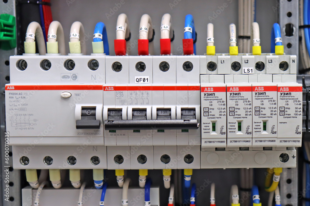 Foto de ABB electric circuit breakers installed on a din rail in an ...
