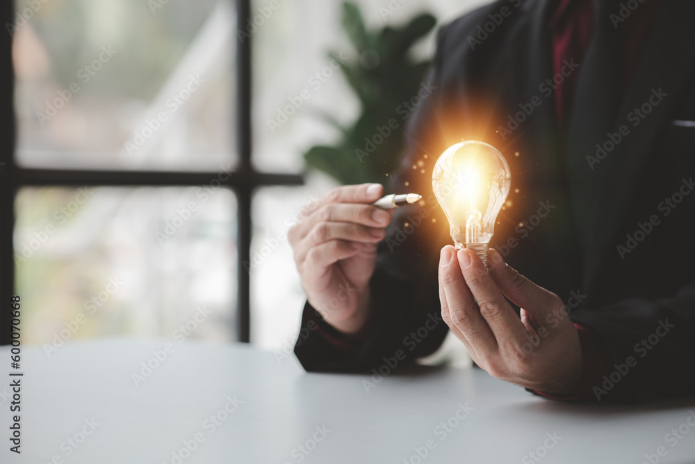 Person holding glowing lamp, Creative new idea. Innovation ...