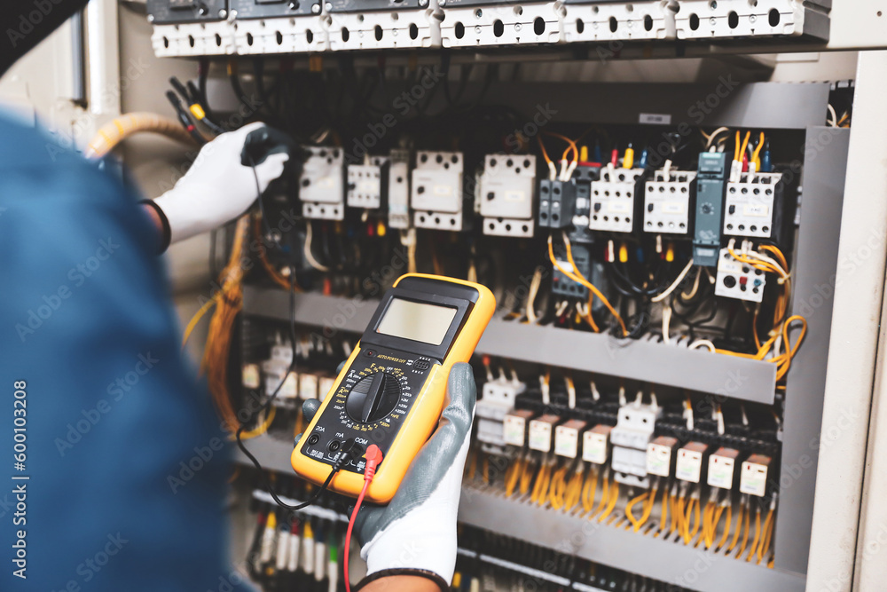 Electricity or electrical maintenance service, Electrician hand holding ...