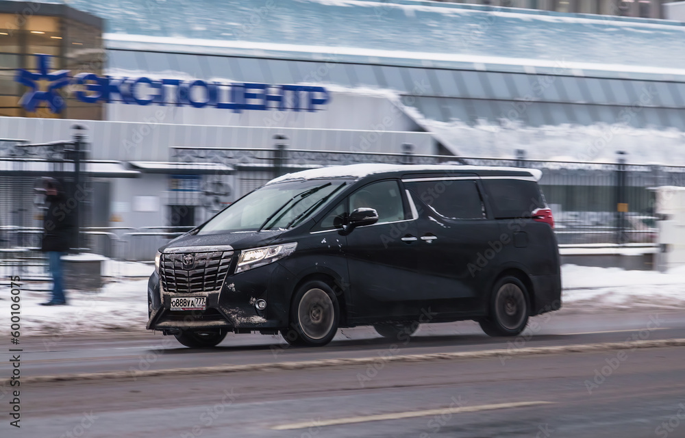 Black Toyota Alphard minivan produced by the Japanese automaker, front ...