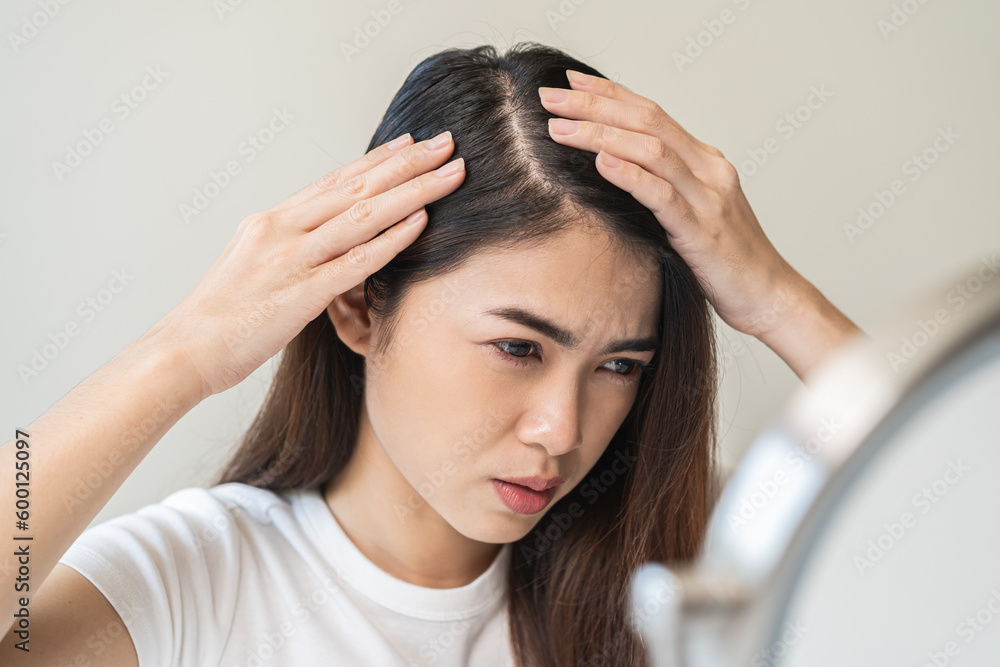 Damaged Hair symptom, face serious asian young woman, girl worry about ...