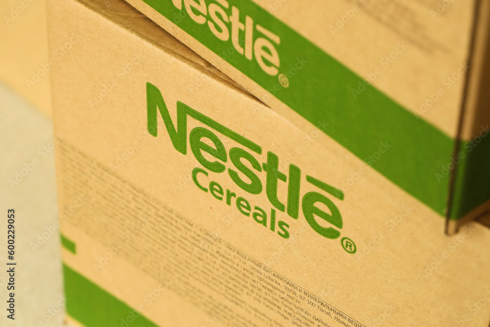 KYIV, UKRAINE - MAY 4, 2022 Big cardboard boxes with logo of Nestle ...
