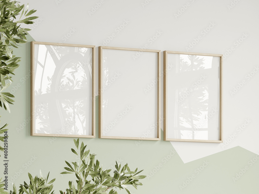 three vertical frames on the white and green wall, boy room interior ...