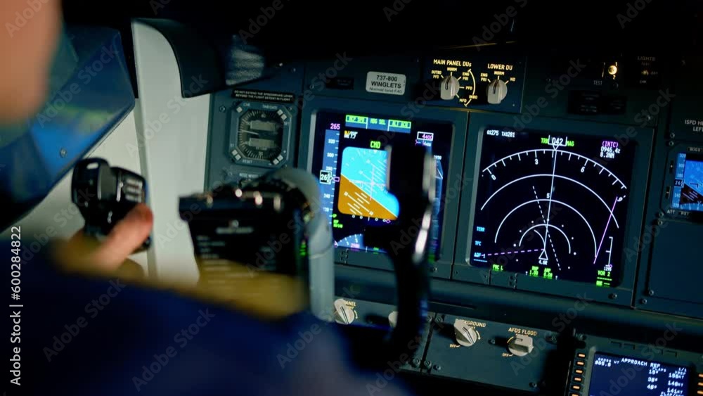 An aircraft control panel in the cockpit with a control panel and a ...