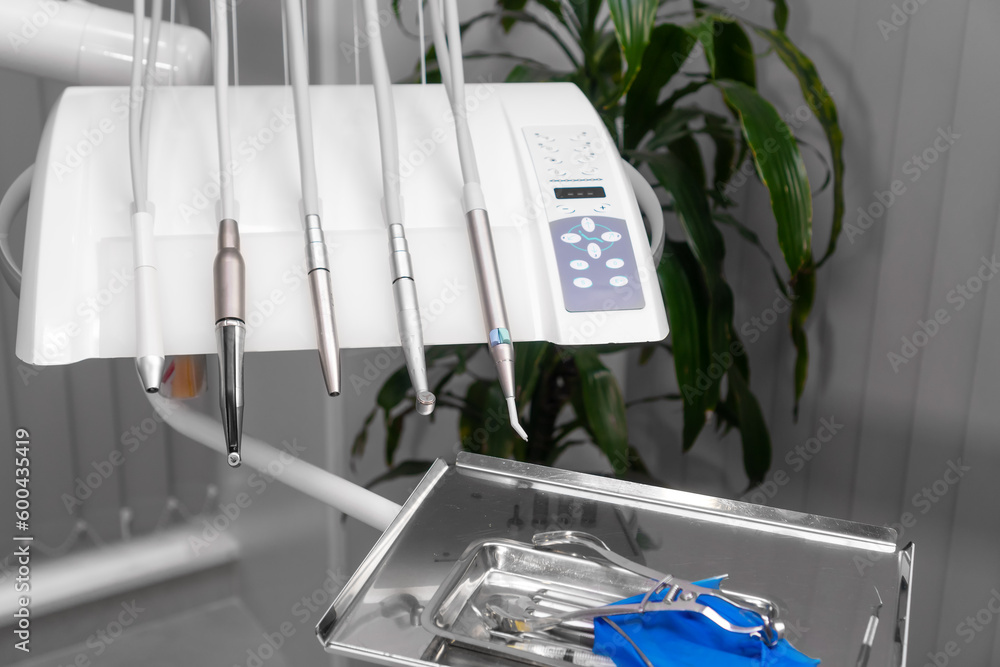 Set of tools for dental treatment at dental clinic. Collection of ...