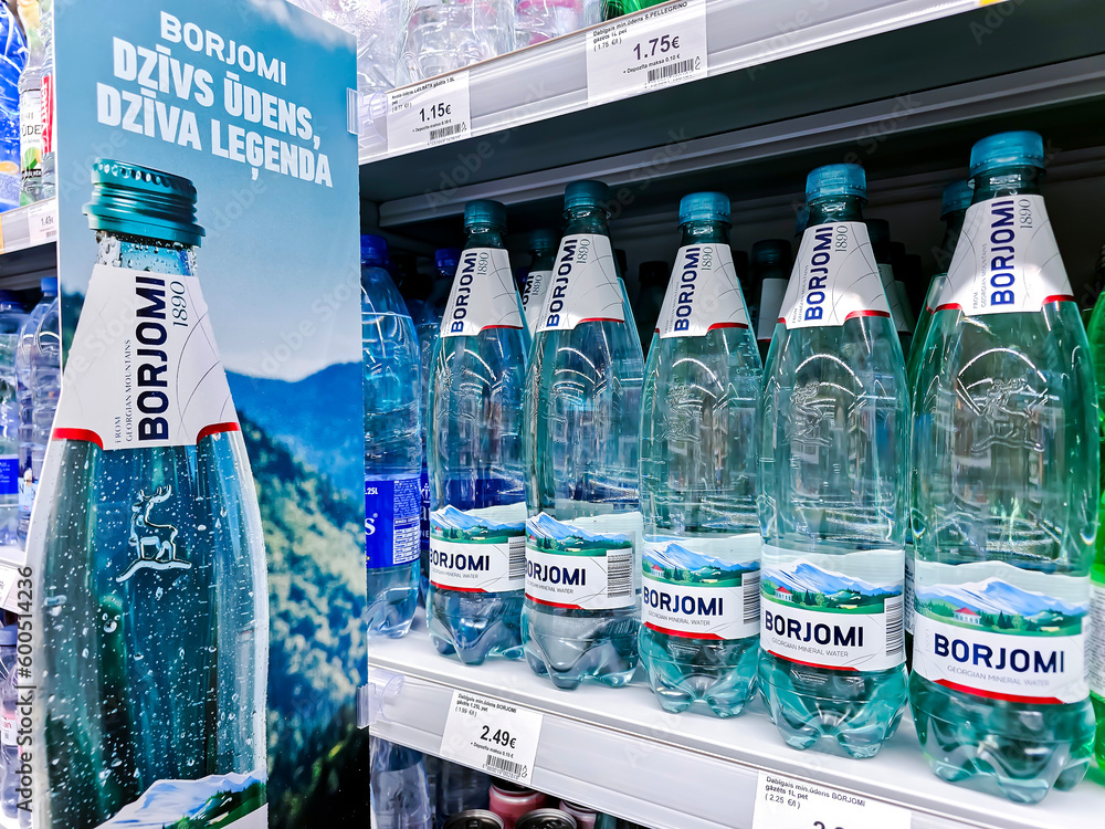 LATVIA, RIGA, MAY, 2023: Borjomi is mineral water on a supermarket shelf. Georgian Glass ...