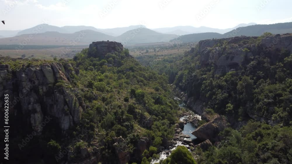 Spectacular drone view of mountains, valleys, ridges and river in ...
