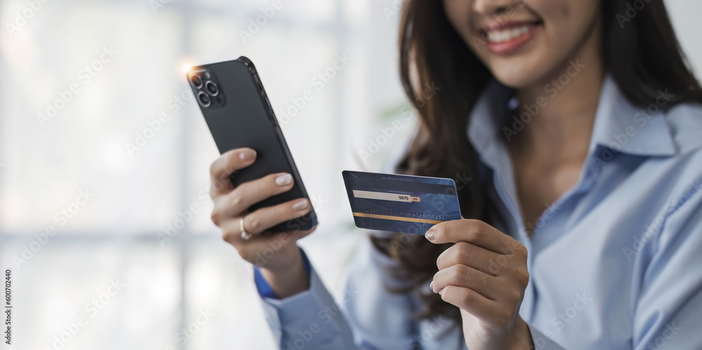 Asian woman shopping online retail store ecommerce using credit card ...